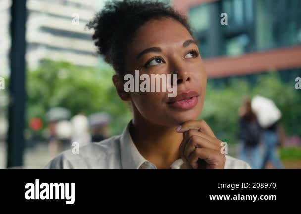 Thoughtful African American thinking contemplate pondering decision ...