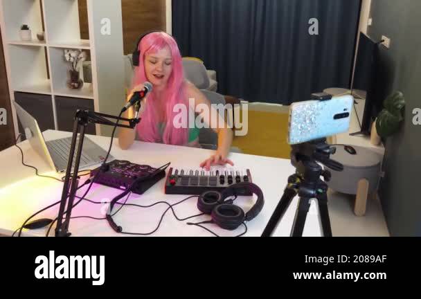 Beautiful young singer and modern musician broadcast from her home ...