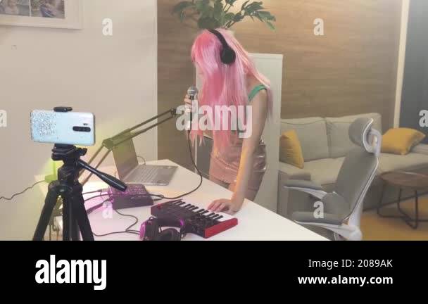 Beautiful young singer and modern musician broadcast from her home ...