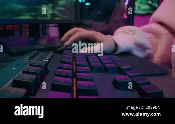 Close up hands typing computer keyboard joyful Caucasian female host ...