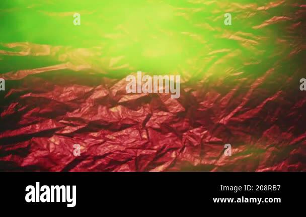 Creased foil. Light flare overlay. Defocused neon green color glow on ...
