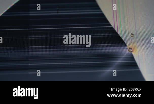 Broken monitor. Screen hole. Dead image zone crossed out by colored ...