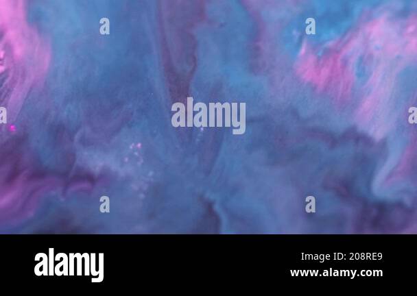 Defocused color splash. Paint mix. Blur blue pink particles texture ...