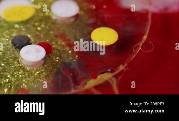 Blur bubbles. Oil emulsion. Red yellow white dark color flow paint ...