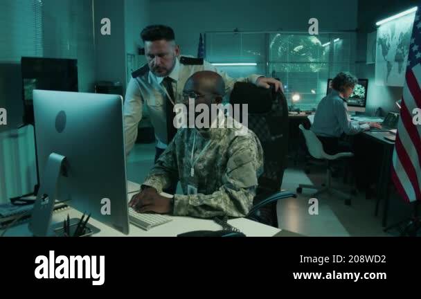 Medium shot of African American and Caucasian male military officers ...