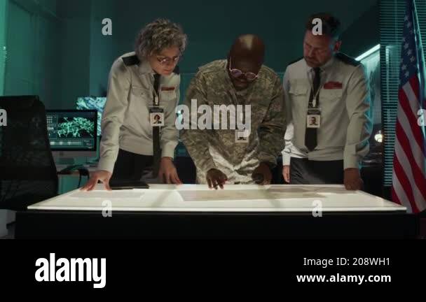 Medium full shot of multiethnic USA army officers standing in ...