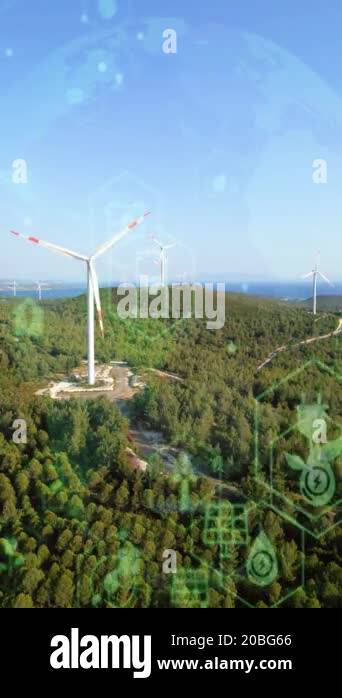 Alternative Energy. Wind farm. Aerial view of horizontal-axis wind turbines generating ...