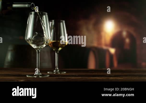 Super Slow Motion of Pouring White Wine into Glass. Filmed on High ...