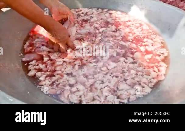 4K Footage A Person's Hands Mixing, Stairring And Washing Pieces Of Raw ...