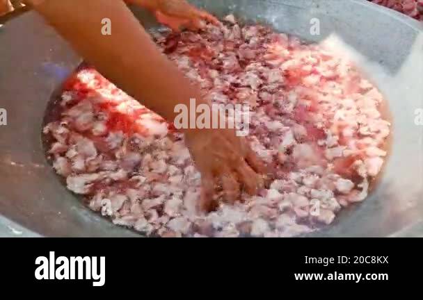 4k Footage Of The Process Of Washing And Cleaning Beef Pieces In A ...