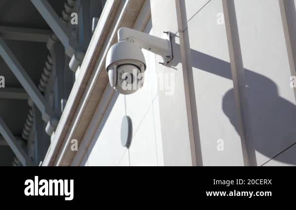 A wallmounted security camera offering extensive surveillance for ...