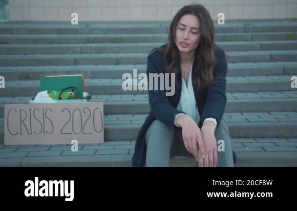 Crisis 2020 banner. People lost their work. Unhappy brunette young ...
