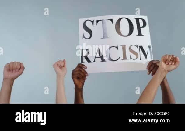 Interracial People Fists Protest on Grey Background. Black Man Hands ...