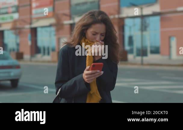 Face woman stand use phone feel sick coughs at outdoor fever cold ...