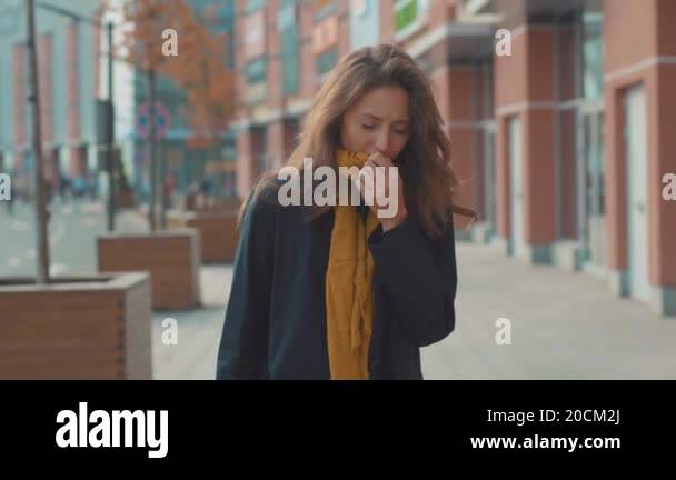 Face young woman stand coughs feel sick at outdoor fever cold allergy ...