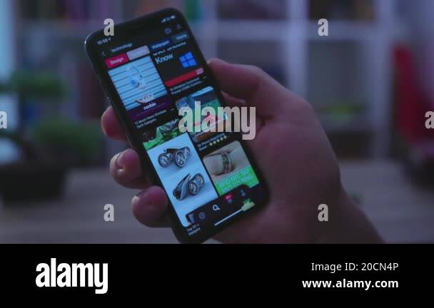 NEW YORK - May 19, 2019: Slow motion hands man uses a phone touch ...