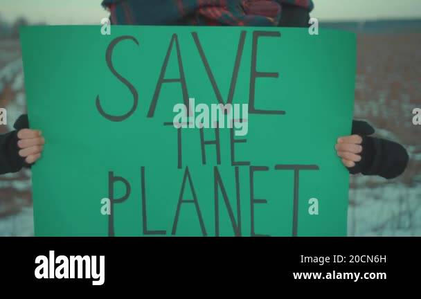 Close up bearded man activist with Save the Planet ecology poster in ...