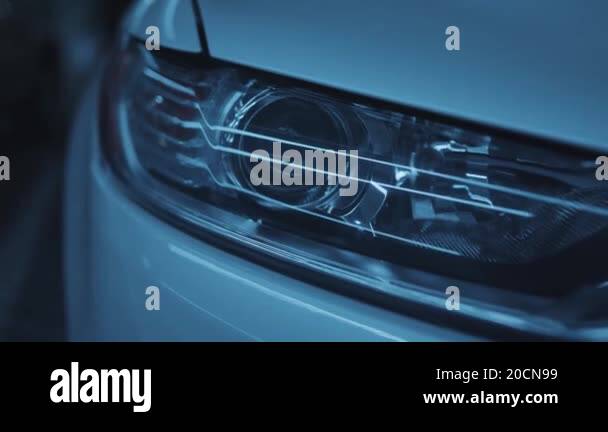 Car details. Close-up luxury new sports white car parked in open space ...