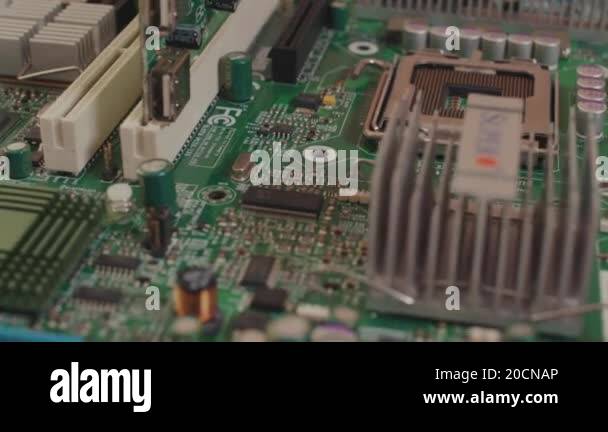 Macro footage of green PC electronic chip board. Close-up motherboard ...