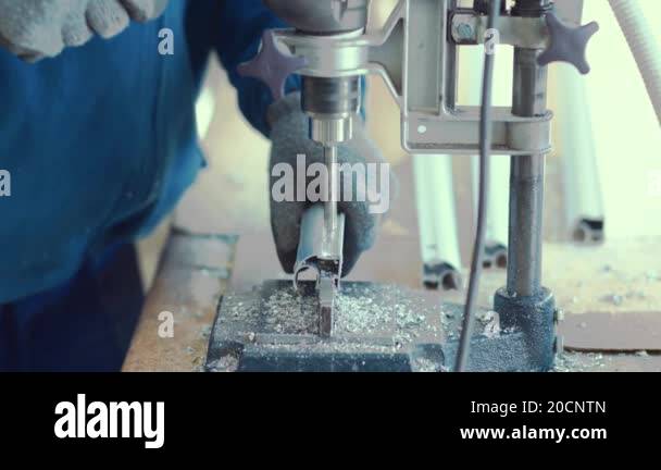 Hands man works with a tool production industry machine engineer equipment factory technology ...