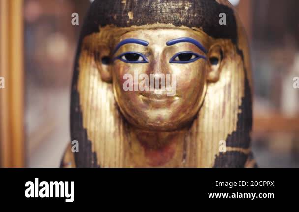 Close up gold face egyptian statue inside the museum sculpture ...
