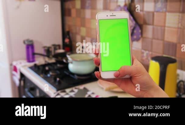 Tokio, Japan - April 7, 2018. Close up womans hand hold smartphone with ...
