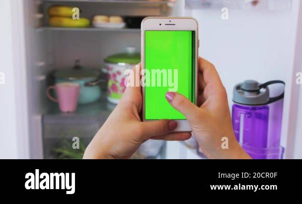 Tokio, Japan - April 7, 2018. womans hand hold use smartphone with ...