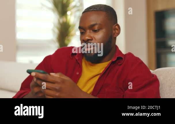 Portrait face african american young man recording voice message use ...