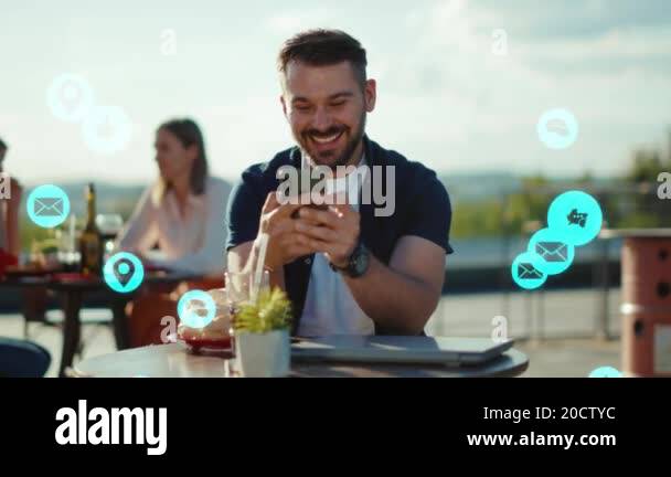 Happy handsome caucasian man using mobile phone social media vlogging ...