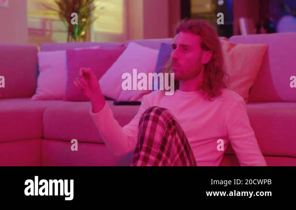 Excited young caucasian man watching smart online Tv watching movies ...