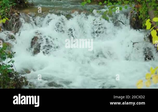 Horizontal terrific view of splashing water in cascade falls. Footage ...