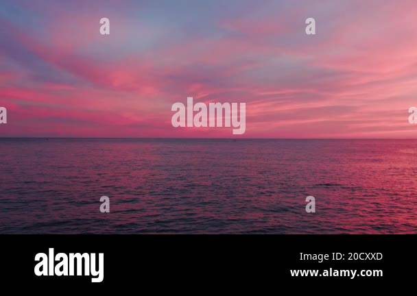 Amazing sunsets pink sun and amazing sea. Fantastic natural. Landscape ...