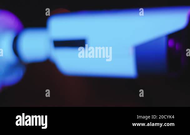 Shot of blue light security video camera surveillance at night ...