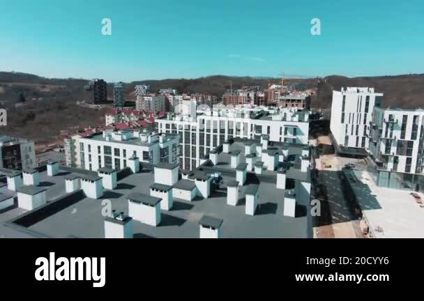 Flying copter over residential constructions development site. Aerial ...