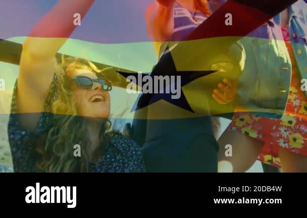 Celebrating with drinks, people waving ghana flag animation in ...