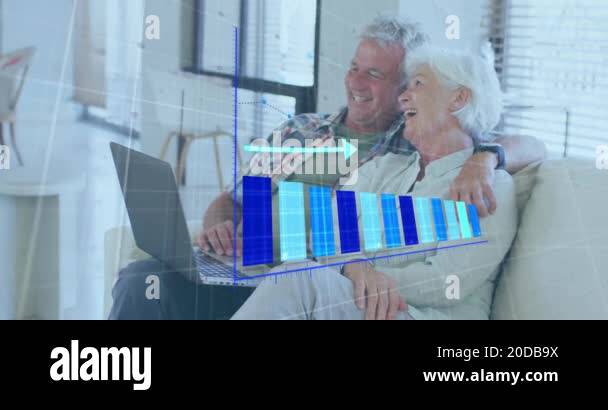 Bar chart and line graph animation over elderly couple using laptop on ...