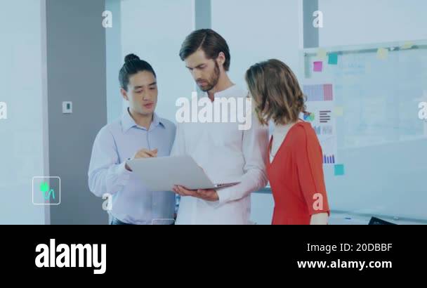 Discussing project on laptop, business team with eco-friendly icons ...