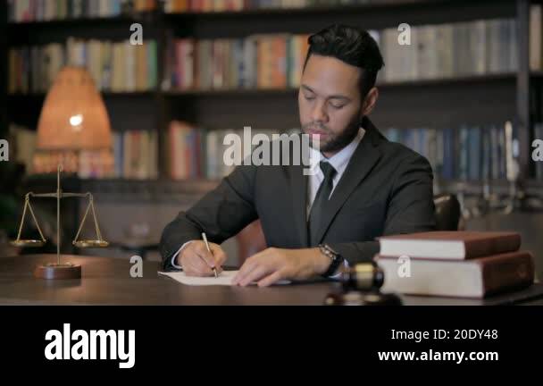 Young Lawyer Writing a Letter in Office Stock Video Footage - Alamy