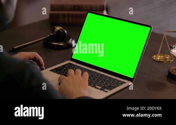 Judge Working on Laptop with Green Screen Stock Video Footage - Alamy