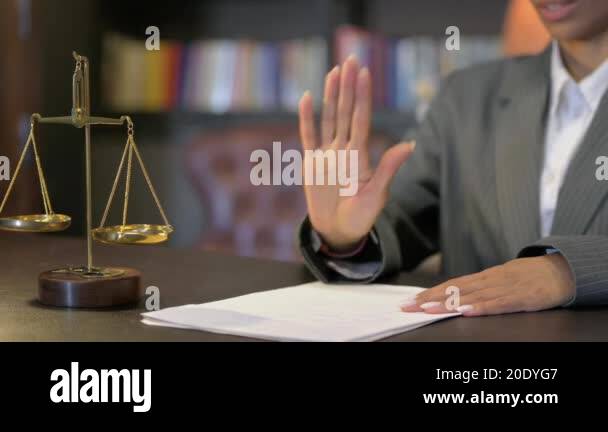 Close up of Judge with Stop Gesture Sitting in Courtroom Stock Video ...
