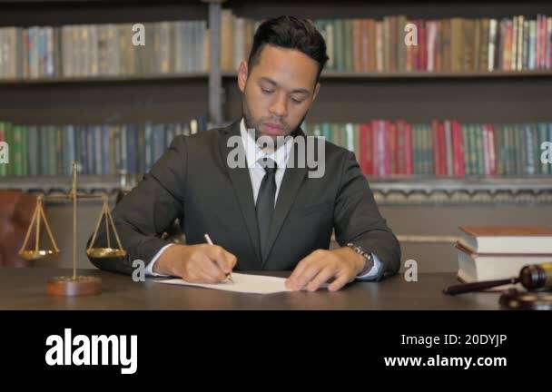 Hispanic Judge Writing a Letter in Courtroom Stock Video Footage - Alamy