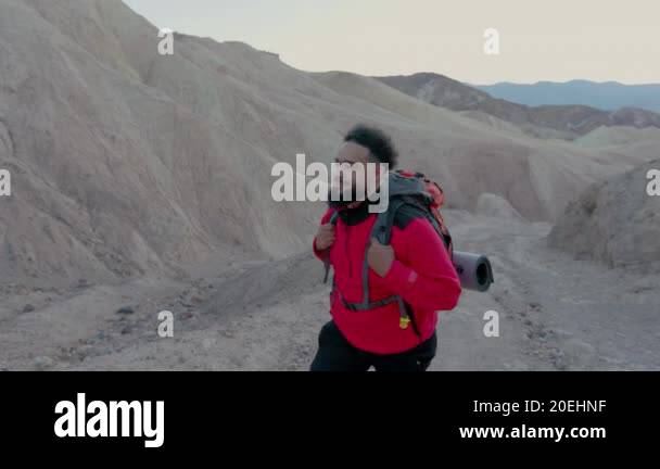 A passionate hiker revels in the stunning landscapes of Death Valley ...