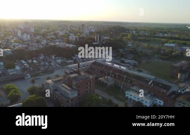 Sunset and sunset in the city of Zarate from the riverbank in a drone ...