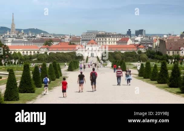 Vienna, Austria - JULY 17, 2024: Crowds of people stroll along the ...