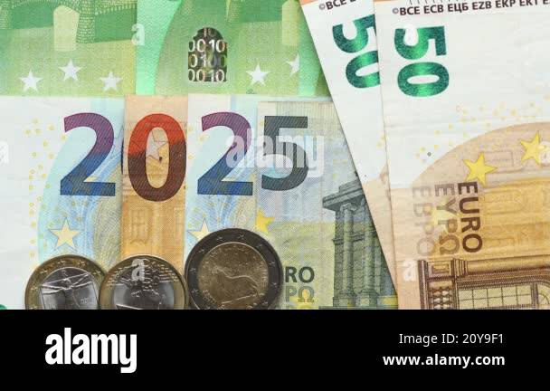2025 in the Eurozone. Euro banknotes arranged in the symbol of 2025 ...