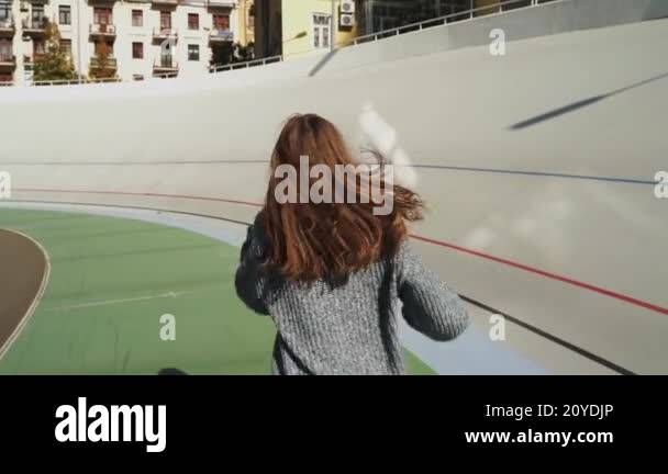 In this energetic video, a woman in a cozy sweater showcases her joyful ...