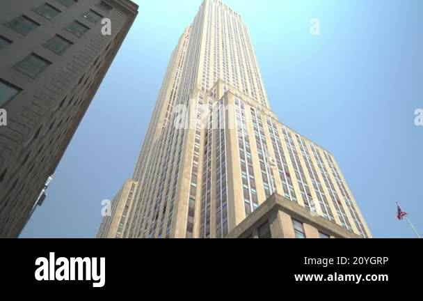 A View of a Skyscraper Towering into the Sky. A captivating upward view ...
