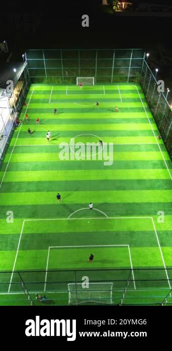 Aerial view of a football match, soccer. Football field and Footballers ...