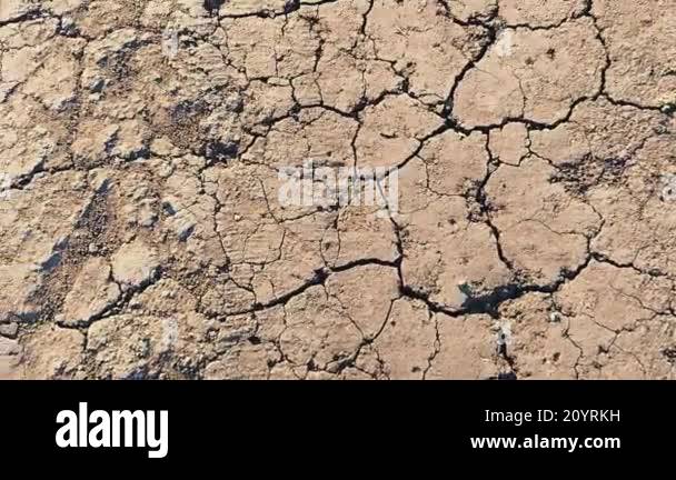 Cracked dry earth exhausted by drought. High quality Stock Video ...