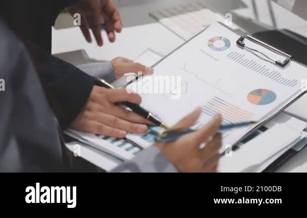 close up of businessman hand using pen on paper Stock Video Footage - Alamy